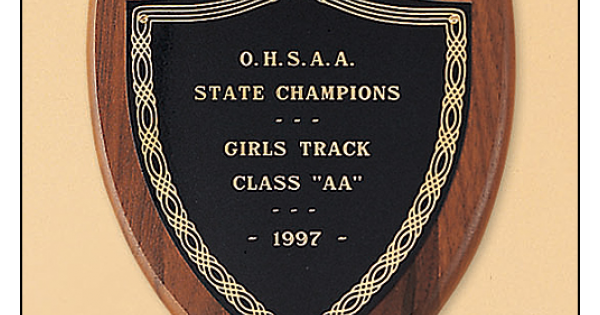 American walnut plaque with a black brass plate